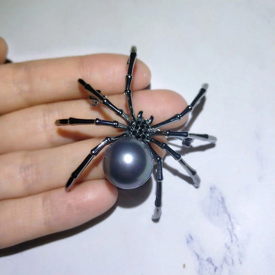 This silver spider is fashionably dramatic! – OddGifts.com